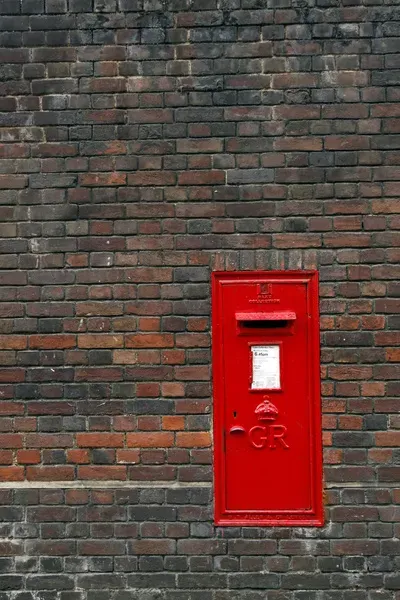 Red English Post Box in a brick wall in Cambridge Our beautiful Wall ...
