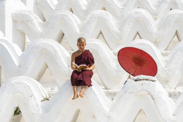 Novice monk reading a book at Hsinbyume pagoda Our beautiful Wall Art ...